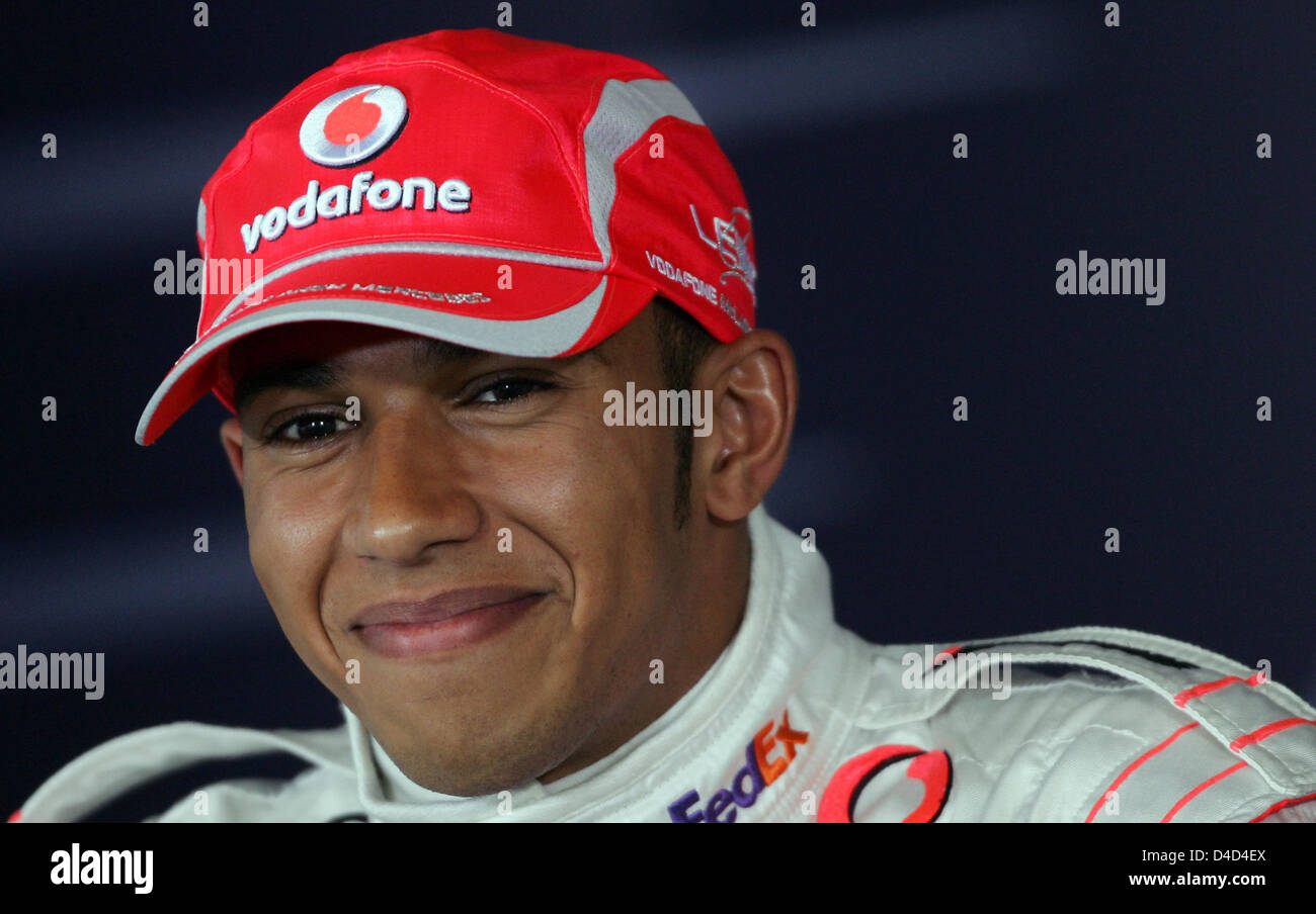 British Lewis Hamilton of McLaren Mercedes smiles at a press conference ...