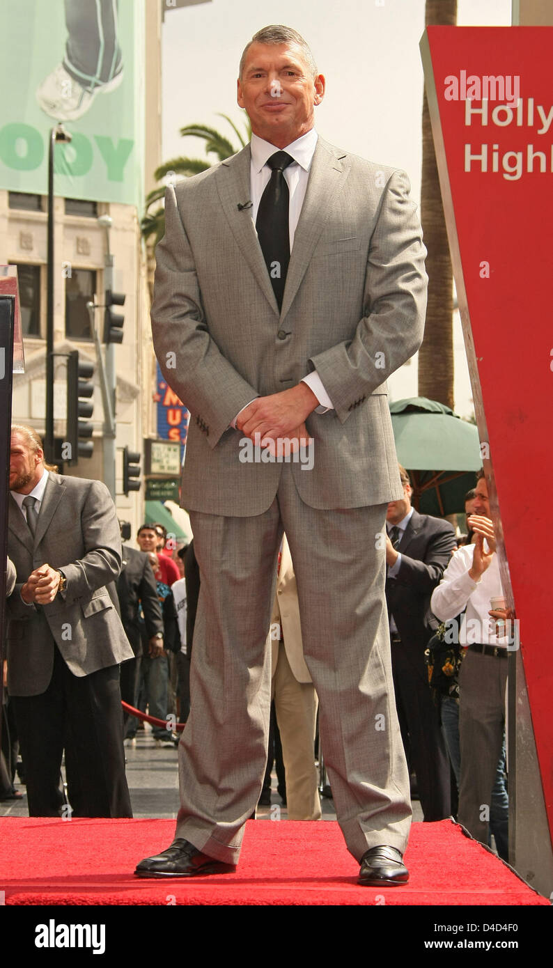 US wrestling promoter Vince McMahon poses as he receives a 'star' on ...