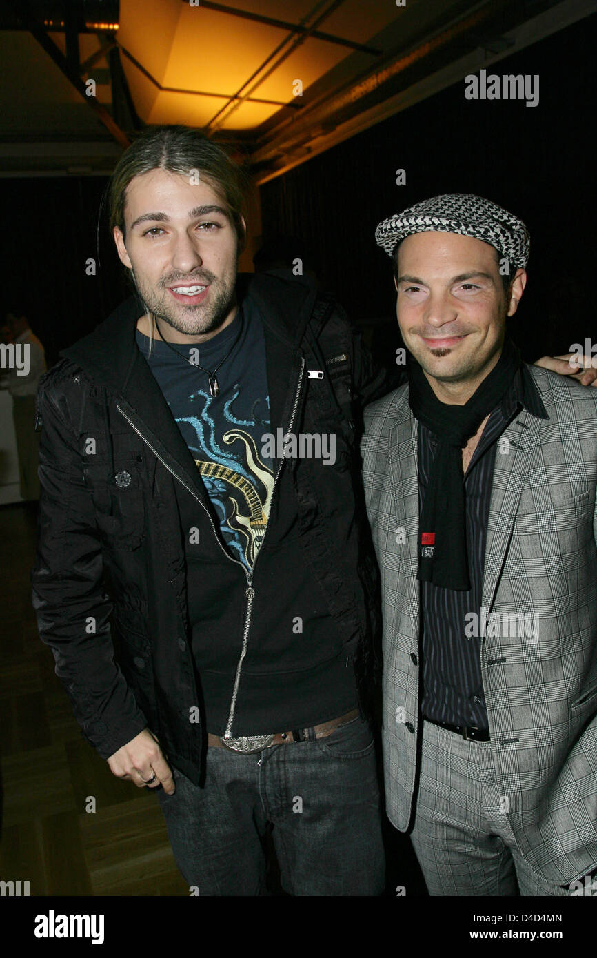German violinist David Garrett poses with German singer Roger Cicero at ...