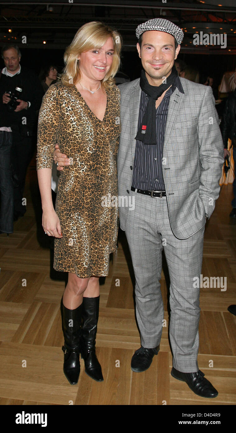 German singer Roger Cicero (R) poses with Tina Palmowski, director of ...