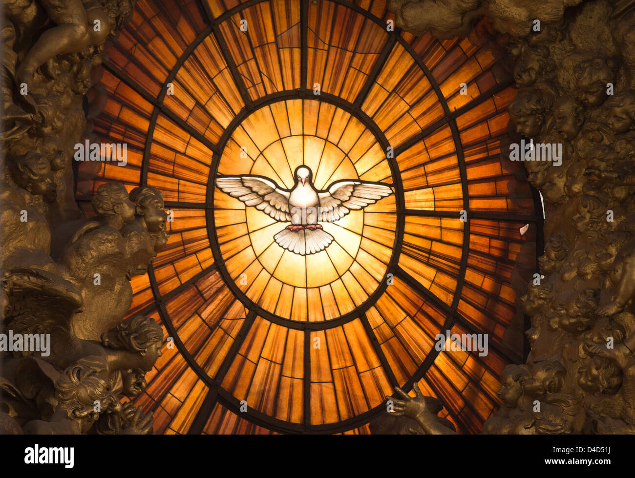 The window with the Holy Spirit representation is illuminated during ...