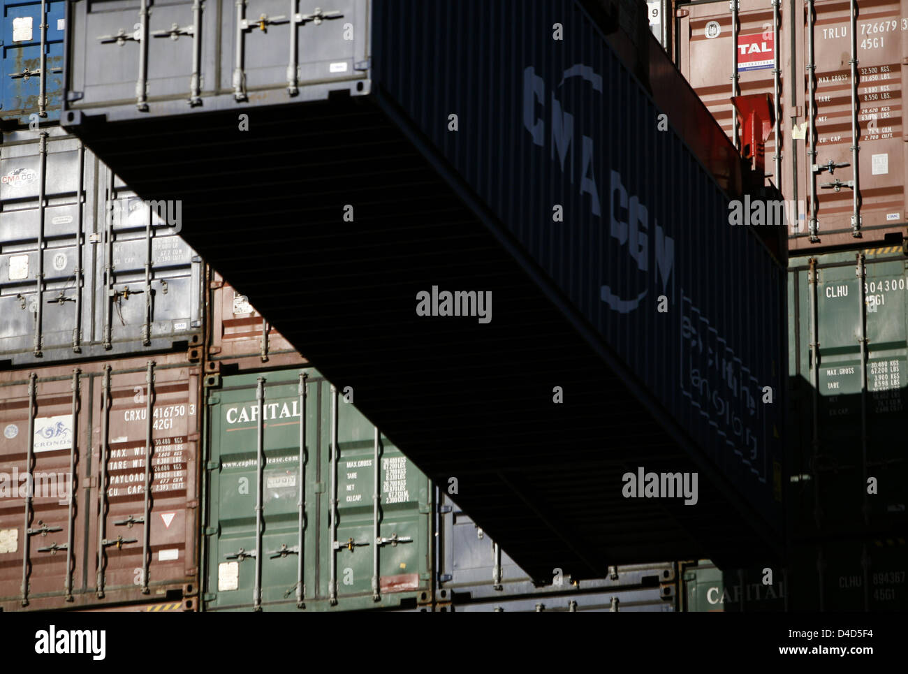Containers are loaded onto ships at the container terminal Euro Quay at ...