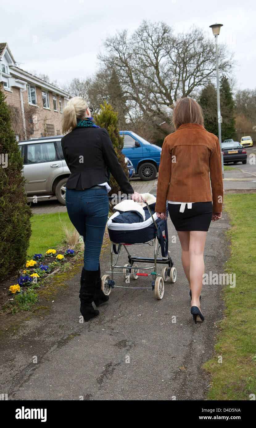 Woman pushing pram hi-res stock photography and images - Alamy
