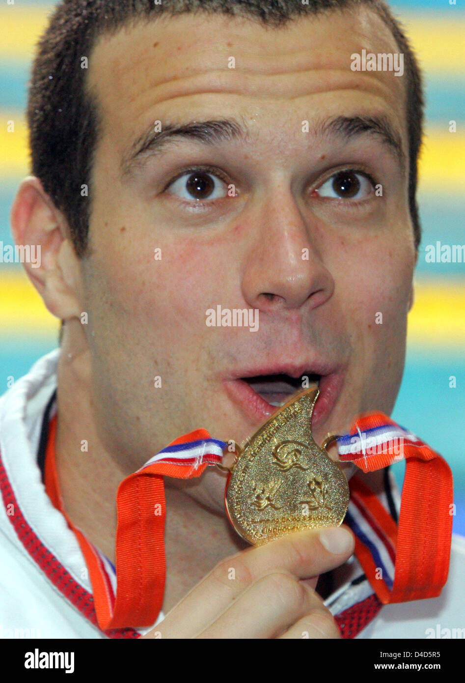 Markus Rogan of Austria poses with his gold medal for winning the Men's ...