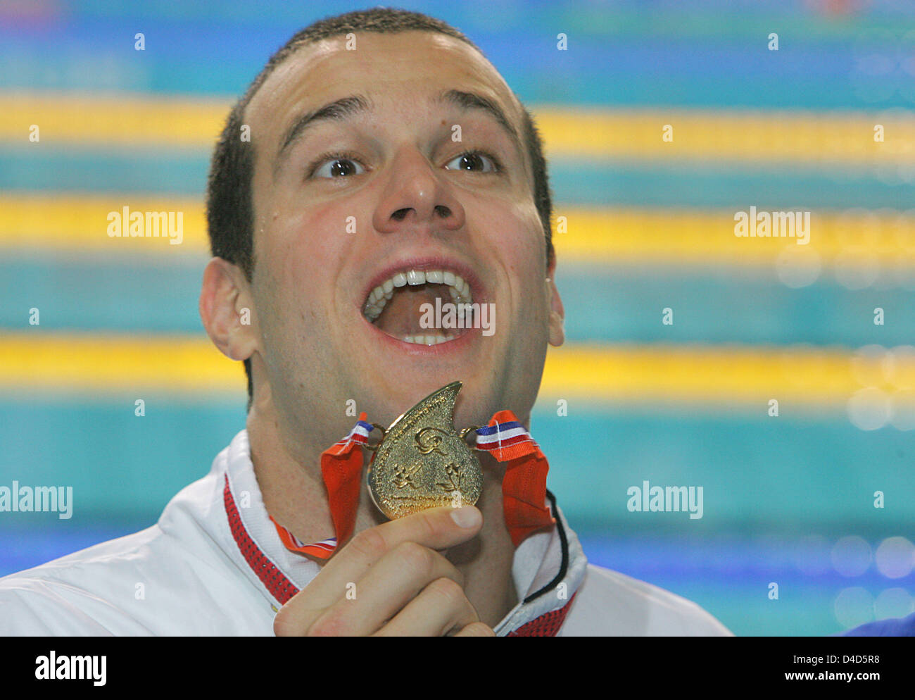 Markus Rogan of Austria poses with his gold medal for winning the Men's ...