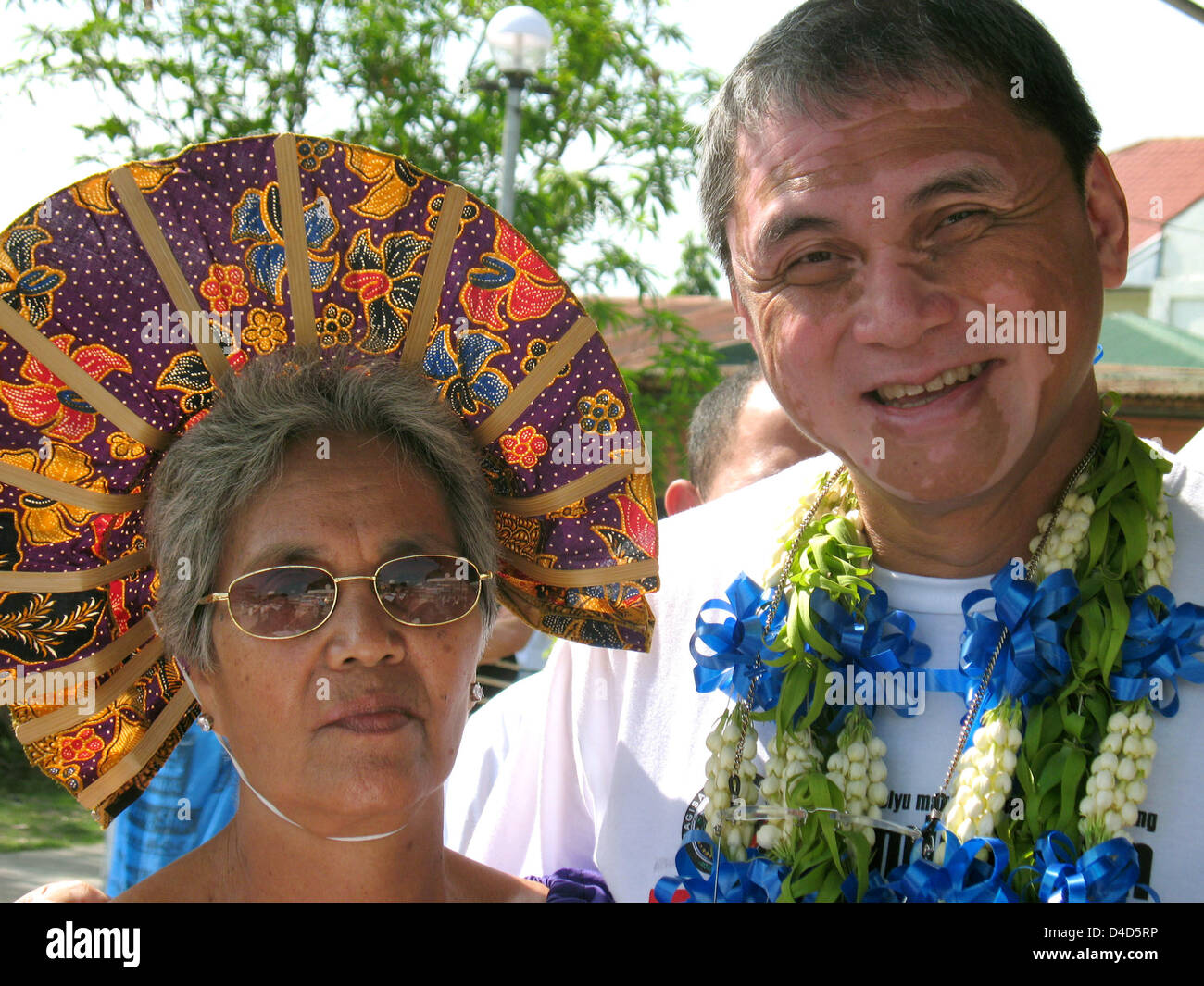 Father Ed Panlilio (R), Govenor of Philippine province Pampagna, smiles ...