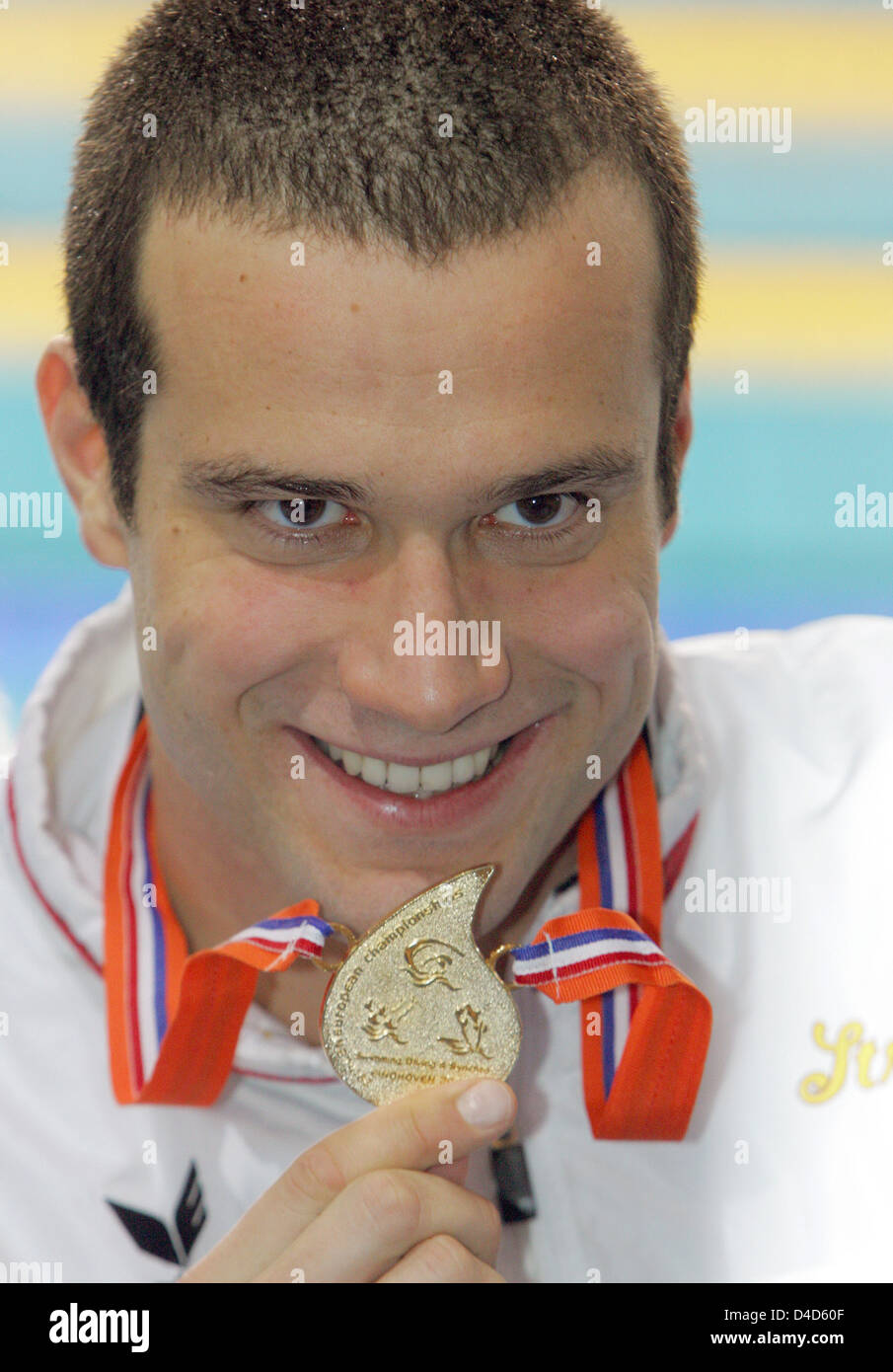 Markus Rogan of Austria poses with his gold medal for winning the Men's ...