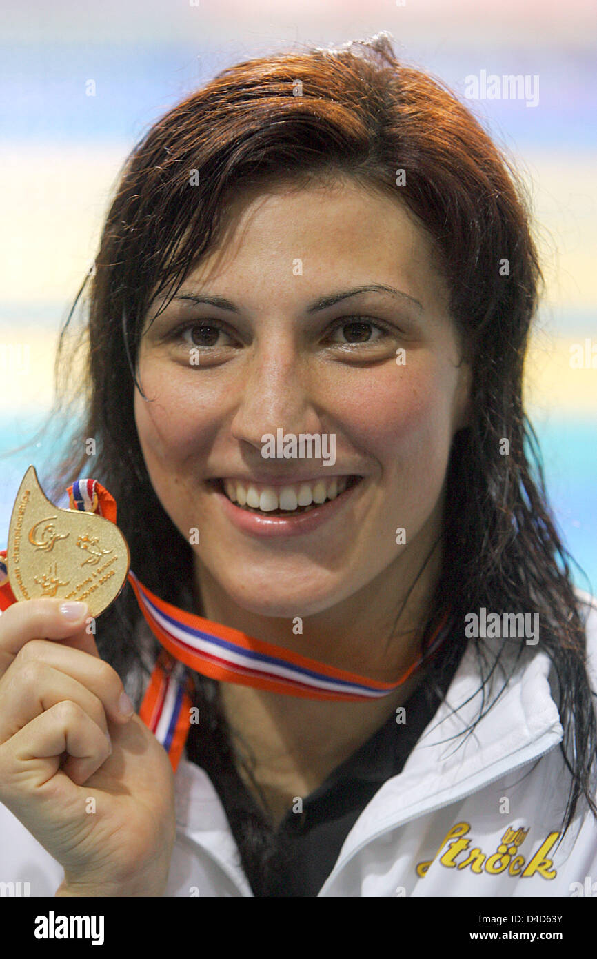 Mirna Jukic of Austria smiles with her gold medal for winning the women ...