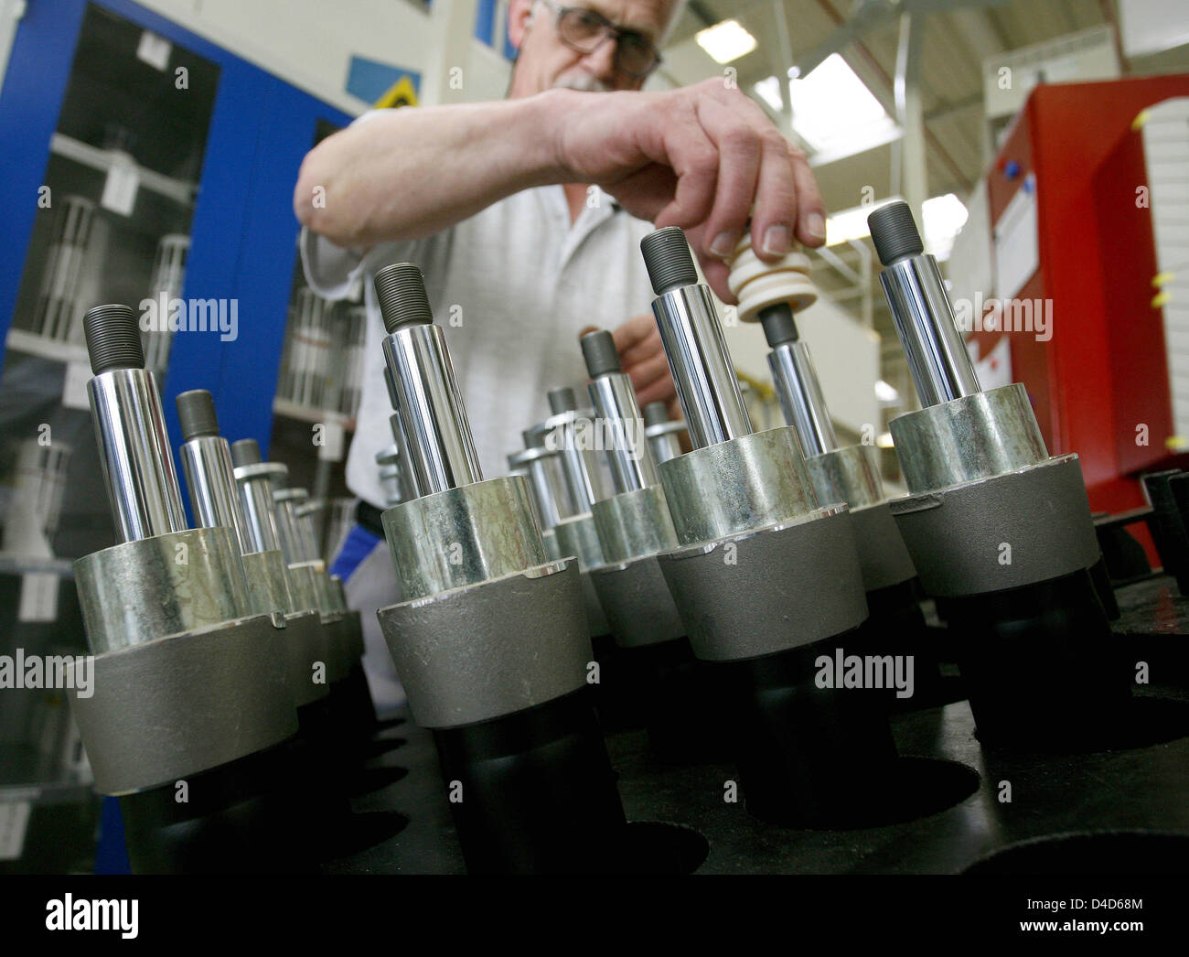 An employee of powertrain and suspension components producer ZF Sachs ...