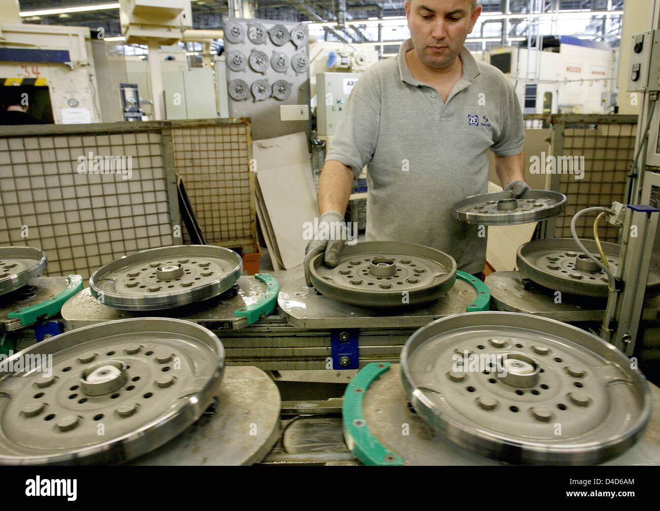 An employee of powertrain and suspension components producer ZF Sachs ...