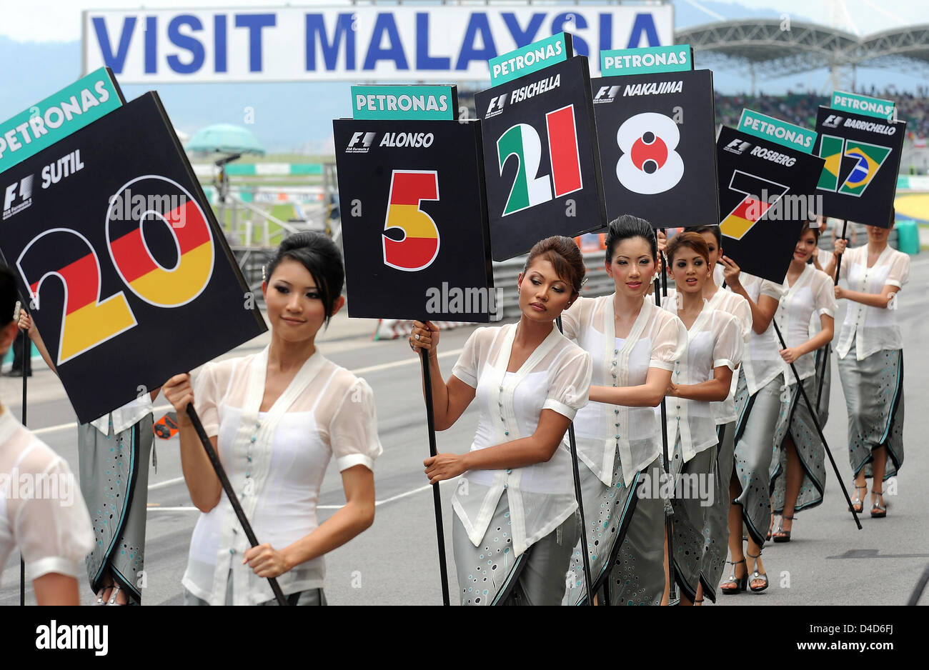 Grid girls line up with the numbers before the 2008 Formula 1 Malaysian ...