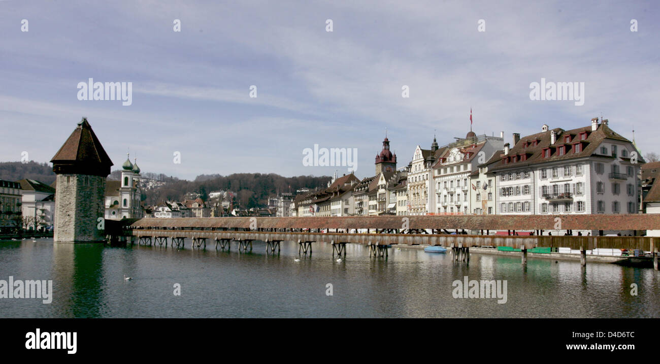 The picture shows a view of Lucerne with the water tower and the Kapell ...