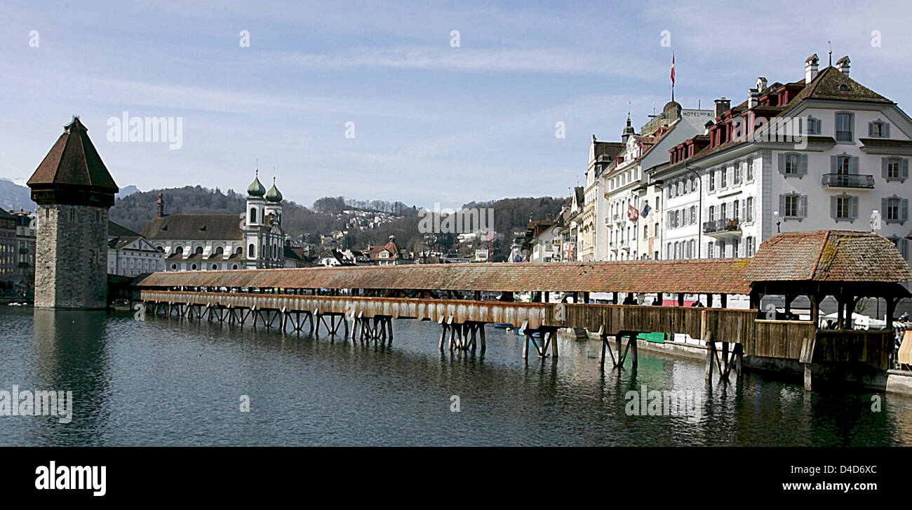 The picture shows a view of Lucerne with the water tower and the Kapell ...