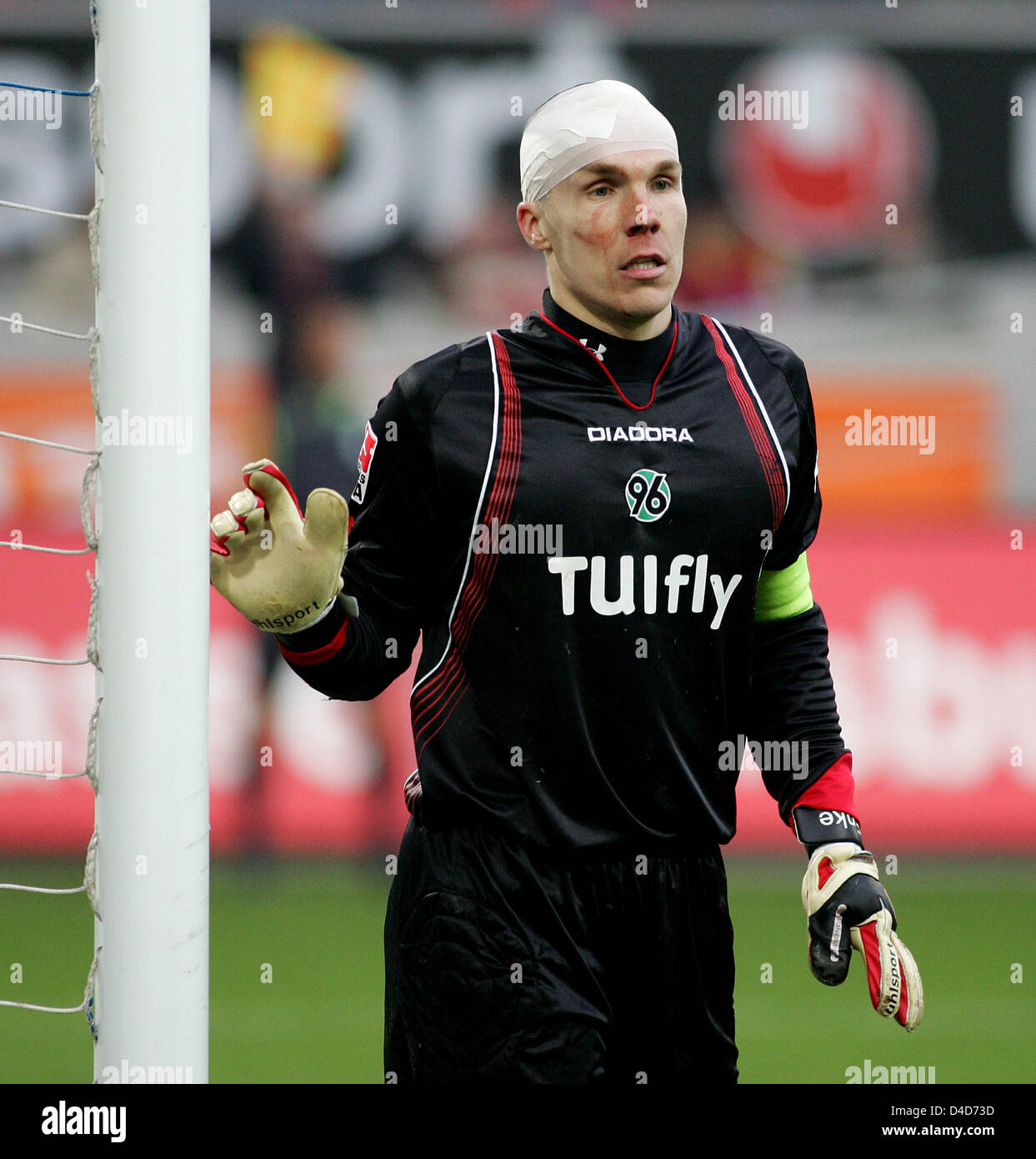 Hanover's goalie Robert Enke is pictured with a bandaged head during ...