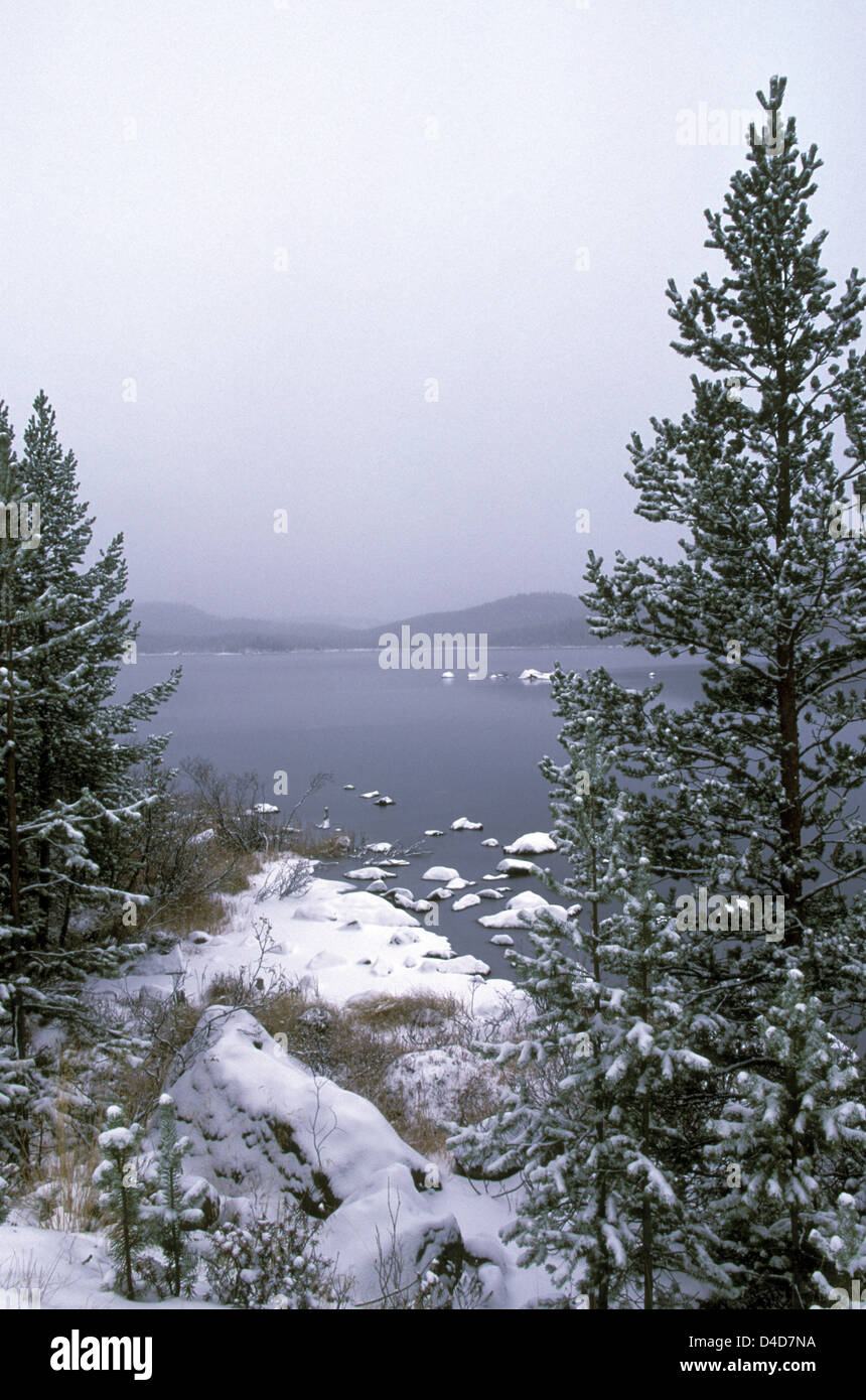 The picture shows the Inarijaervi lake in the winter, in Inari, Finland ...