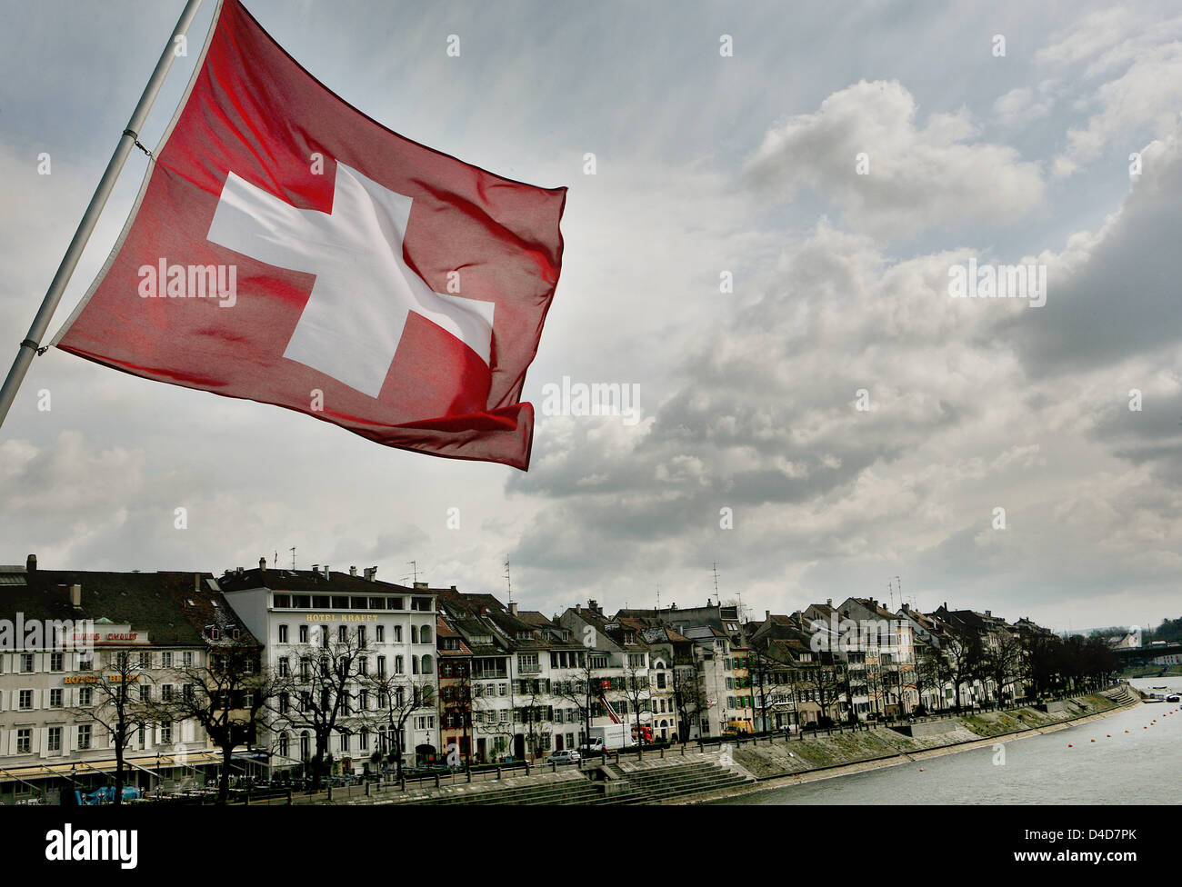 A Swiss flag shown on a bridge in Basel, Switzerland, 25 March 2008 ...