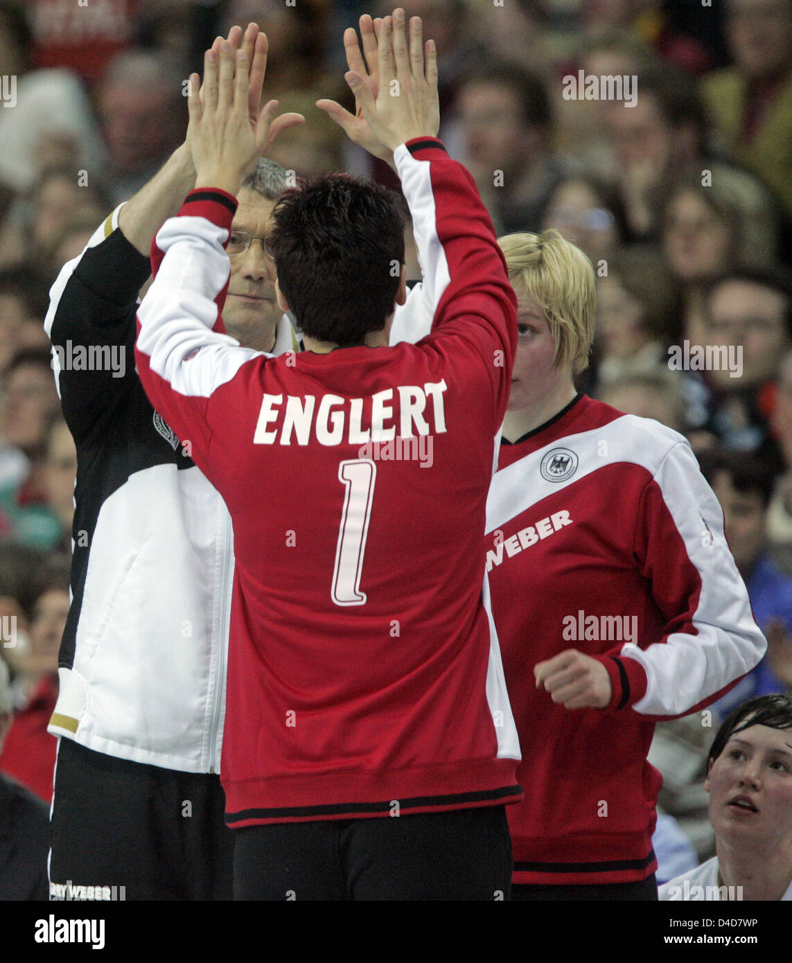 Germany's head coach Armin Emrich (front) celebrates with goalkeeper ...