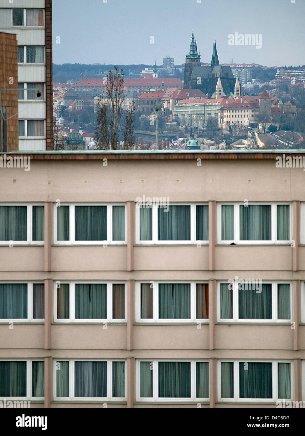A city view of Prague with Prague Castle in the background and a ...