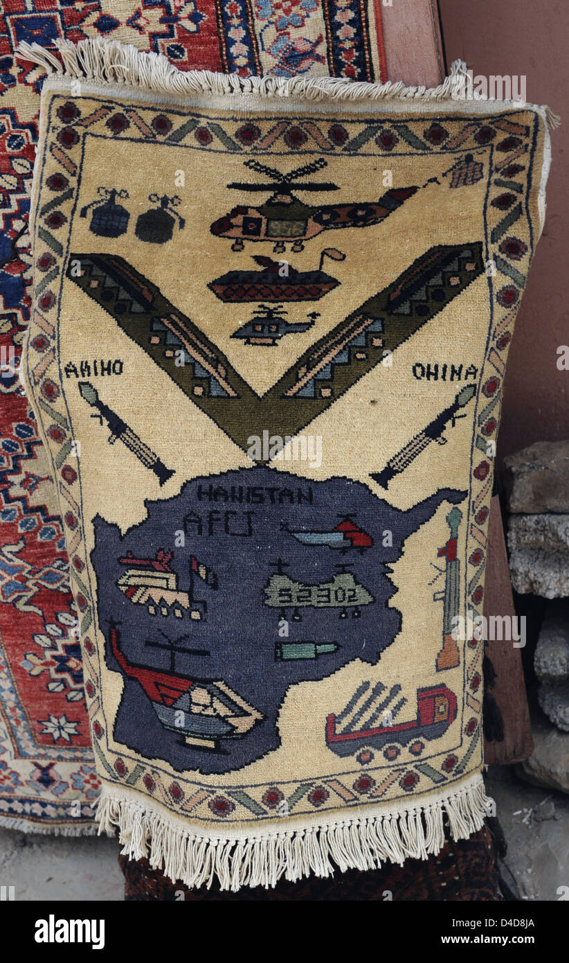 The picture shows a carpet with war motifs in a store in Riyadh, Saudi ...