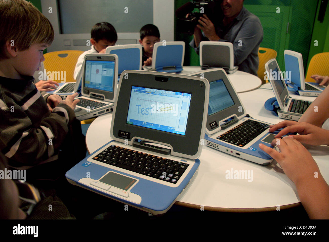 The undated handout by US computing company Intel shows pupils and ...