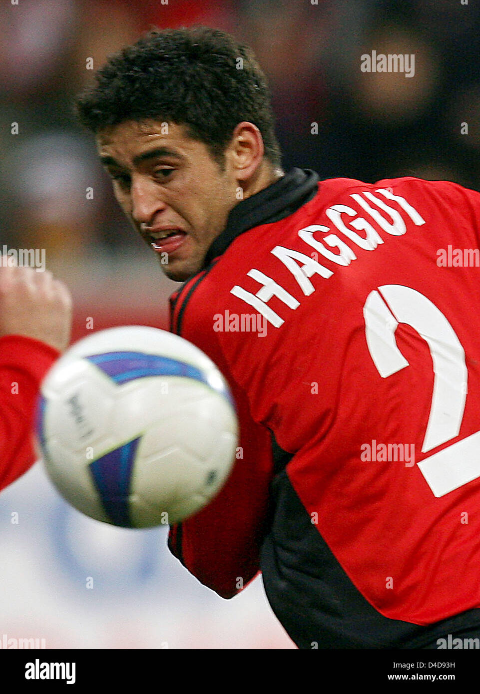 Karim Haggui of Leverkusen is on the ball in the UEFA Cup quarter ...