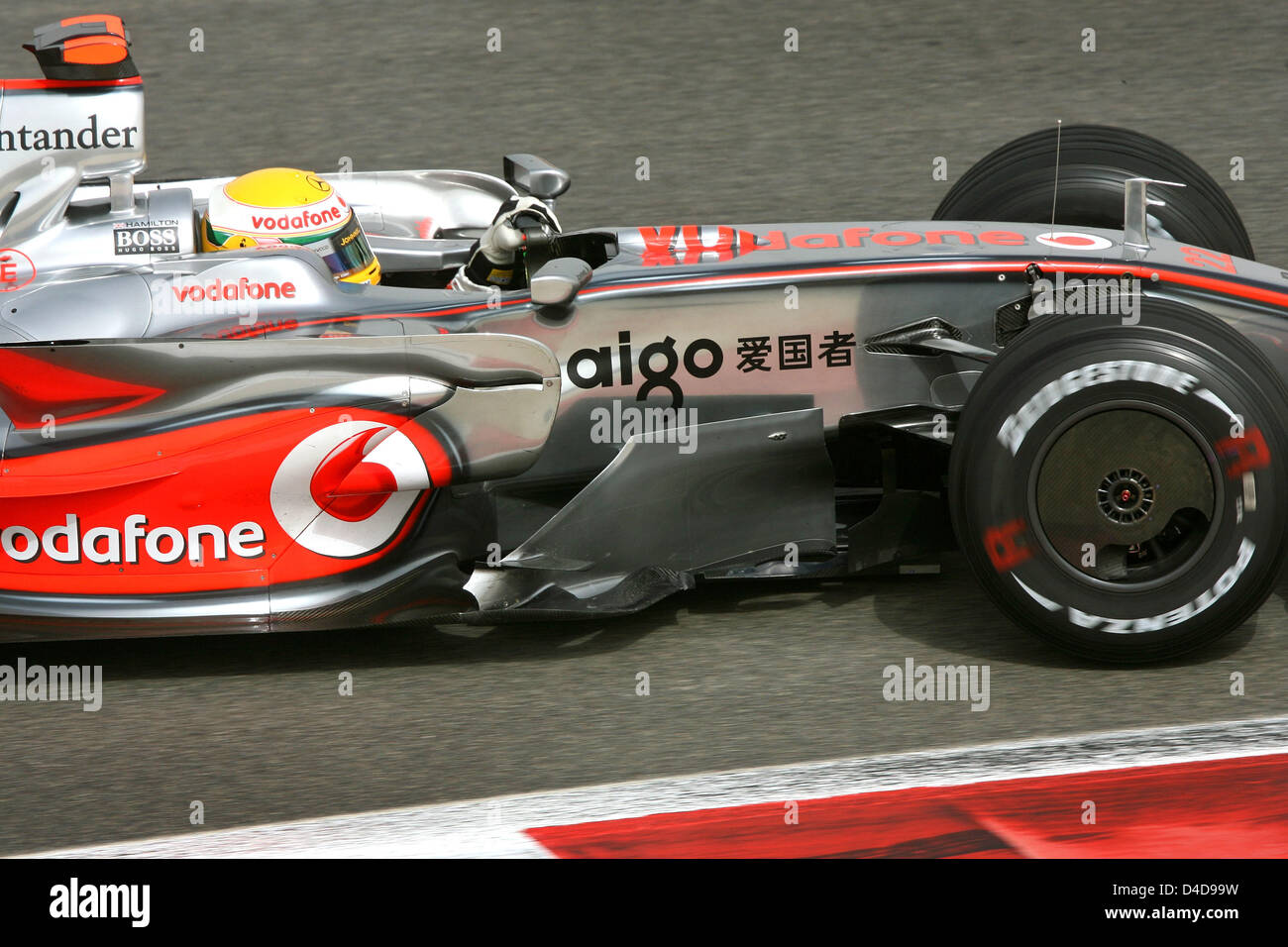 British Formula One driver Lewis Hamilton of McLaren Mercedes steers ...