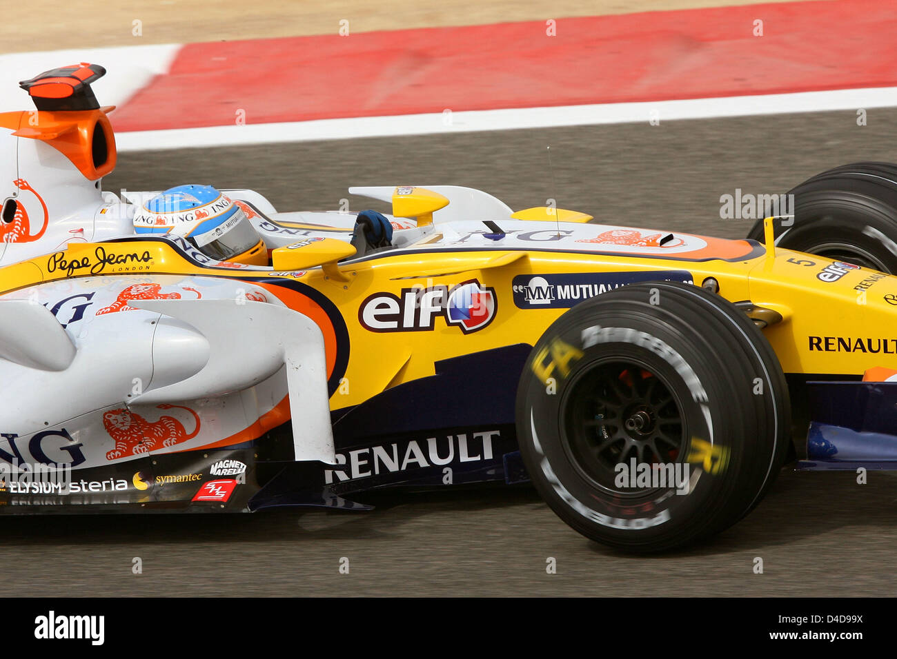 Spanish Formula One driver Fernando Alonso of Renault steers his car ...