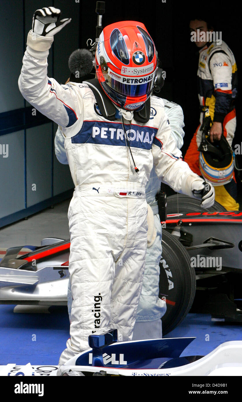 Polish Formula One driver Robert Kubica of BMW Sauber celebrates after ...