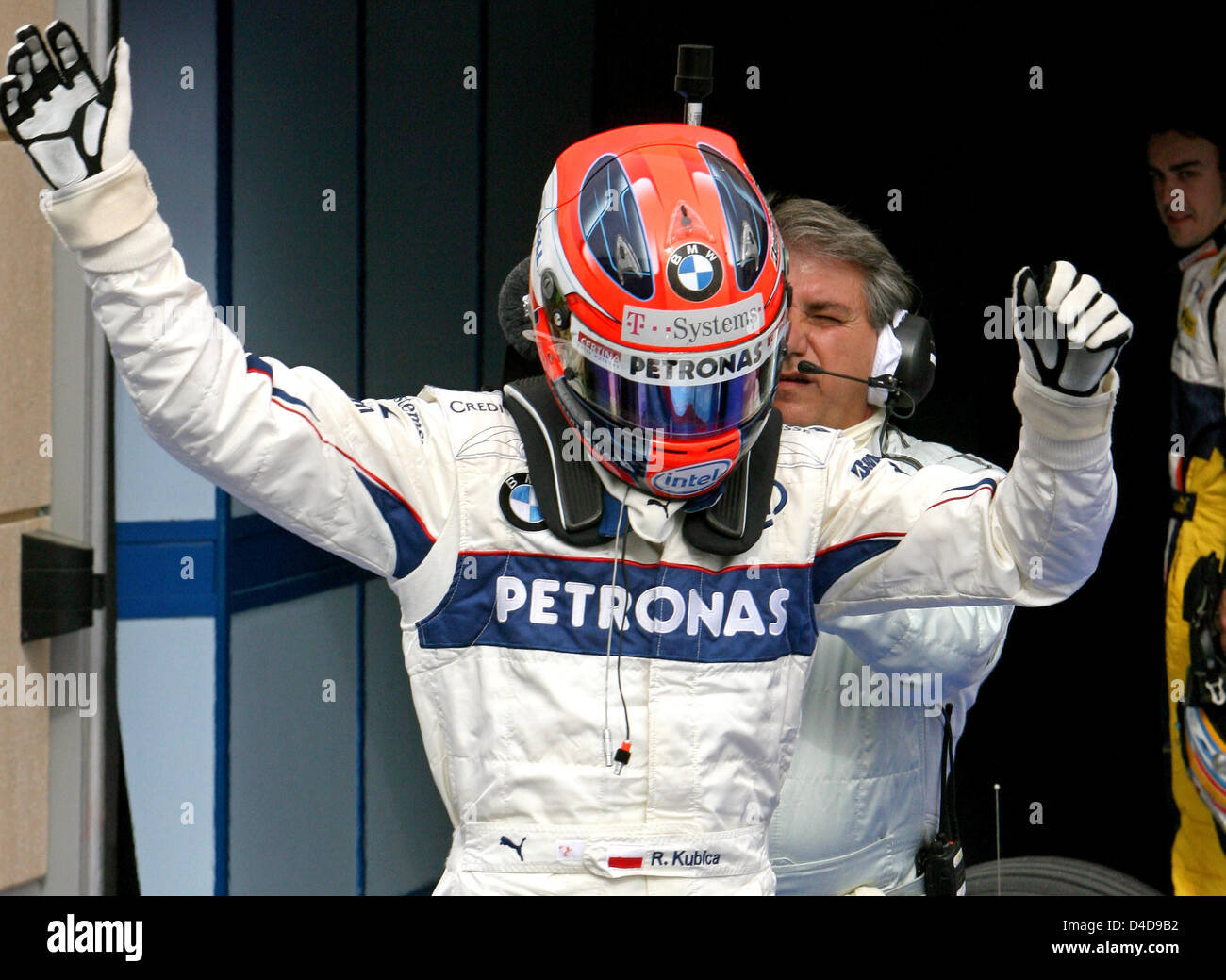 Polish Formula One driver Robert Kubica of BMW Sauber celebrates after ...
