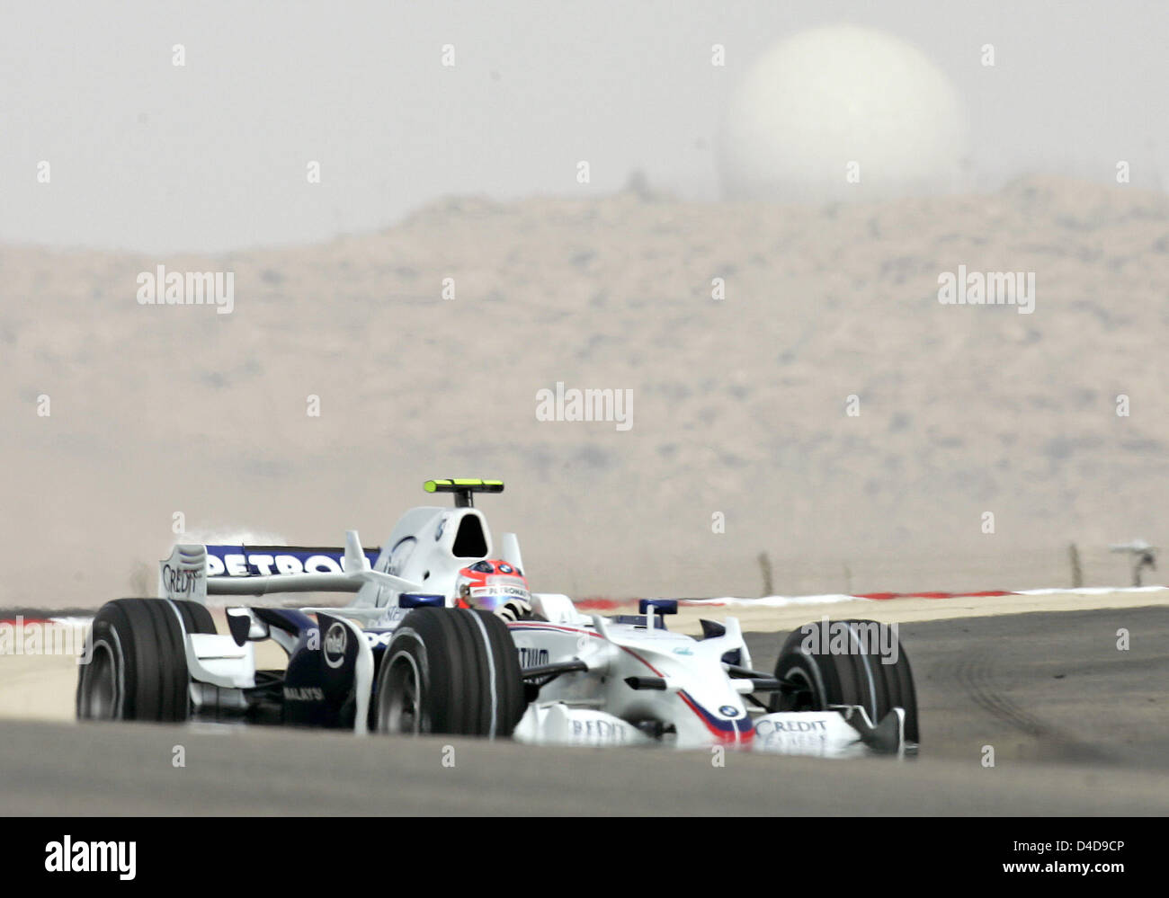 Polish Formula One driver Robert Kubica of BMW Sauber steers his car ...