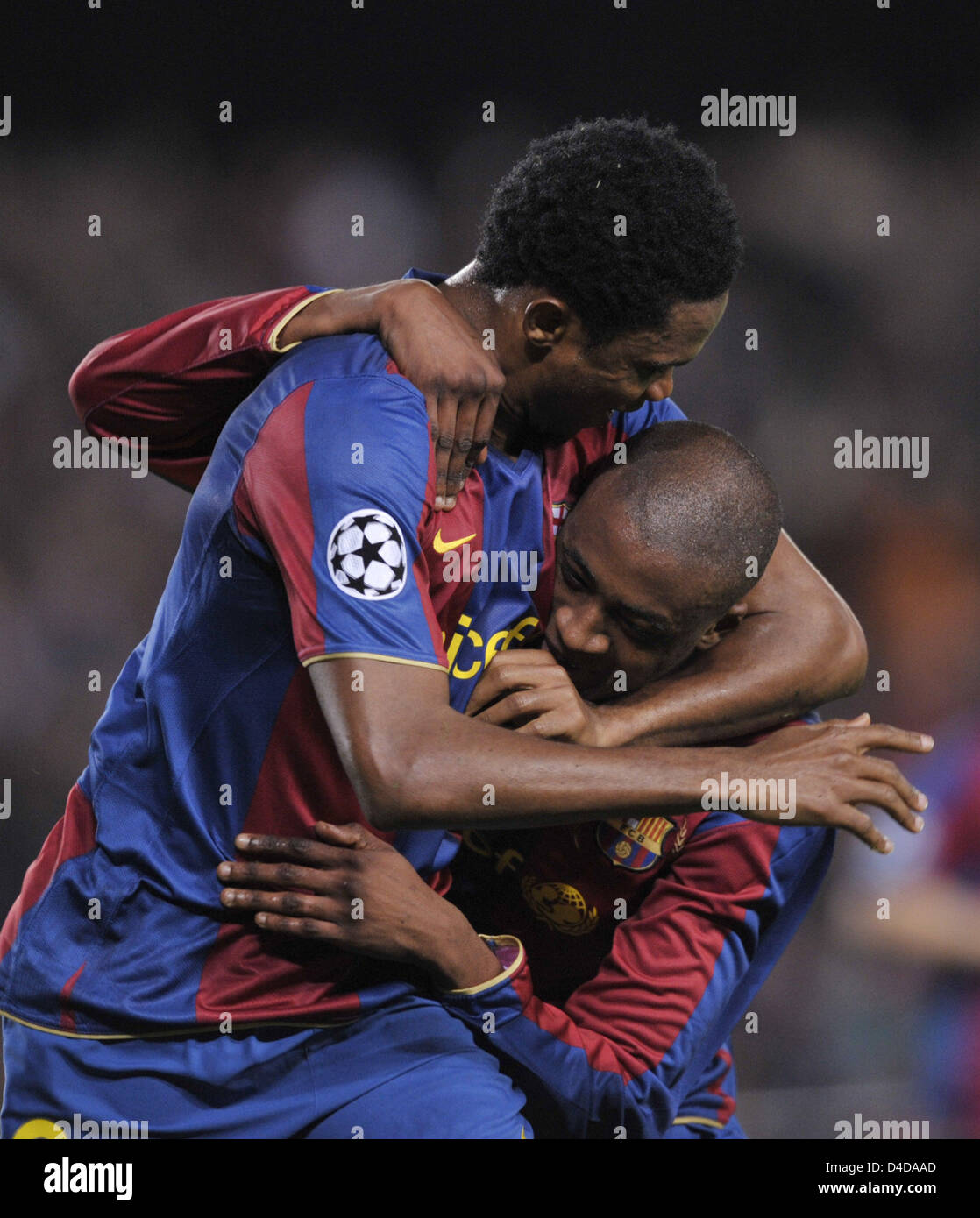 Barcelona's Yaya Toure (R) celebrates with his team-mate Samuel Eto'o ...