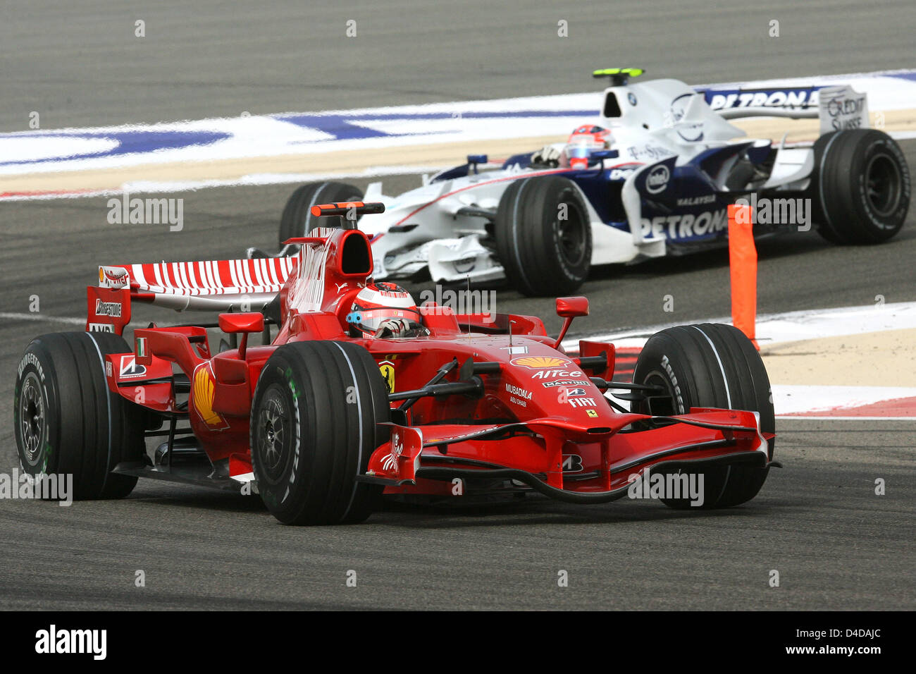 Finnish Formula One driver Kimi Raikkonen of Scuderia Ferrrari (front ...