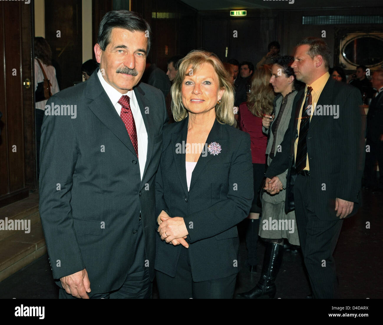 Chairman of the Daimler supervisory board Manfred Bischoff (L) and his ...