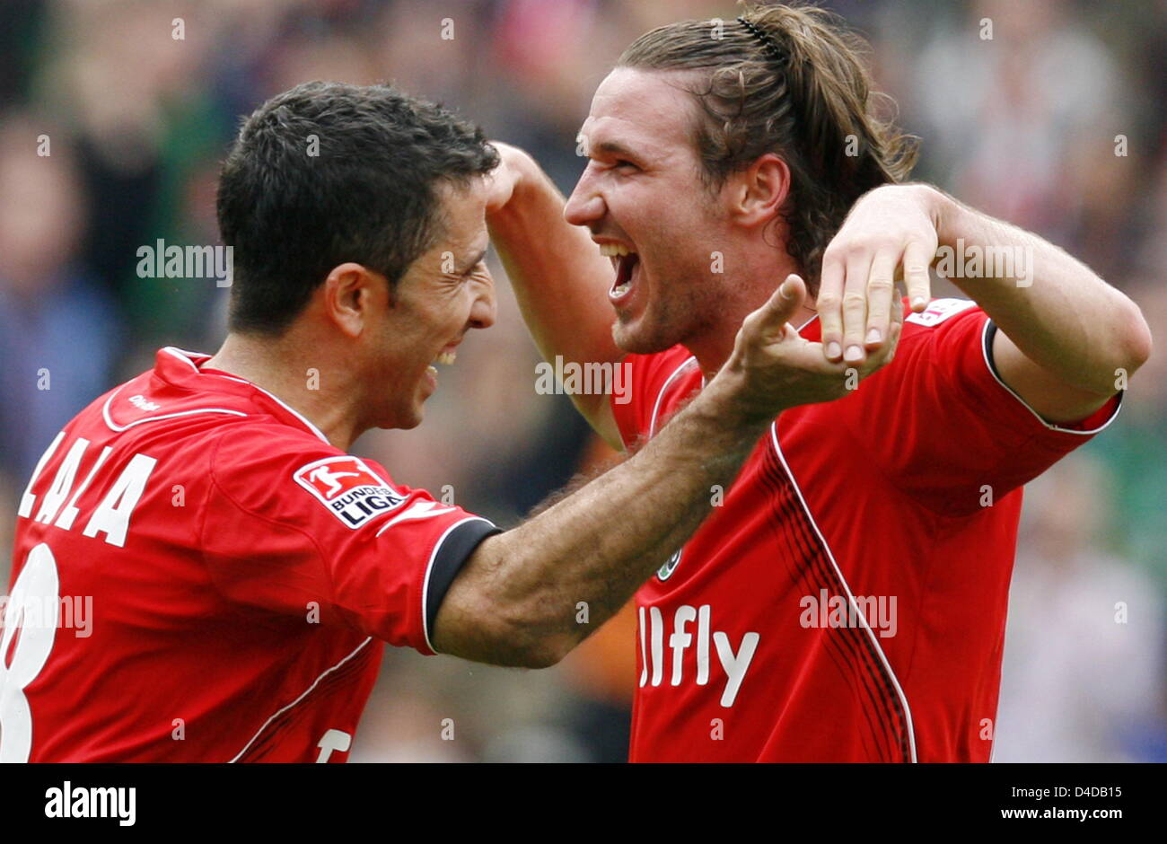 Hanover's Altin Lala (Albania) cheers with goalgetter Christian Schulz ...