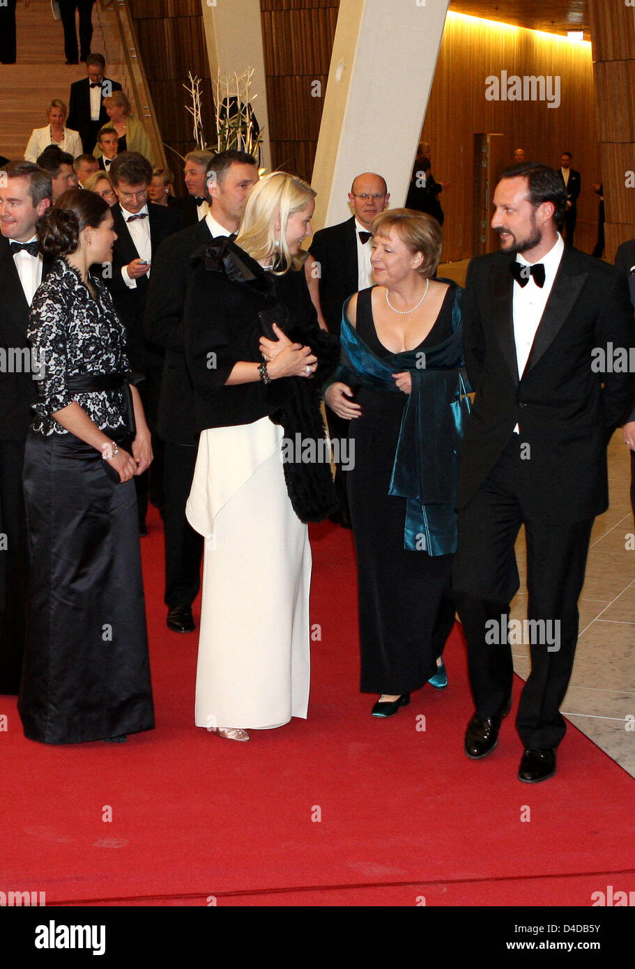 German Chancellor Angela Merkel (2-R) is welcomed by Swedish Crown ...