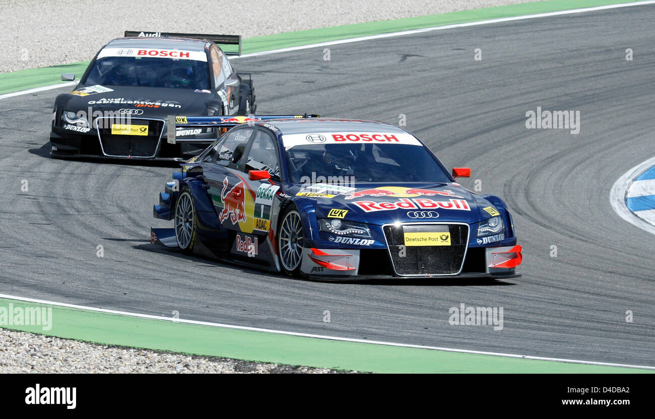Swedish race driver Mattias Eckstroem of Audi races ahead of celebrates ...