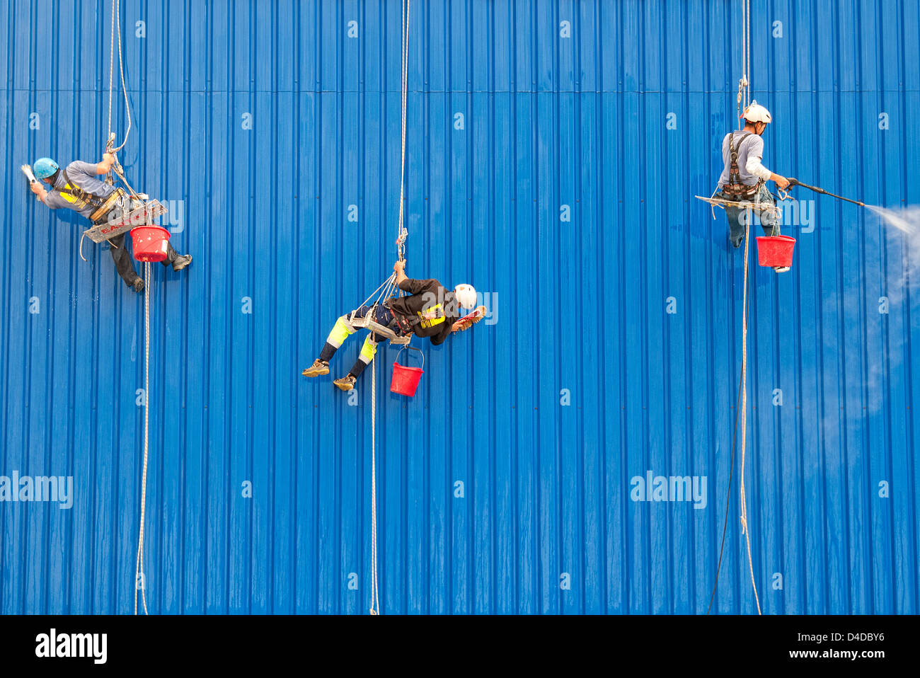 cleaners washing building Stock Photo - Alamy