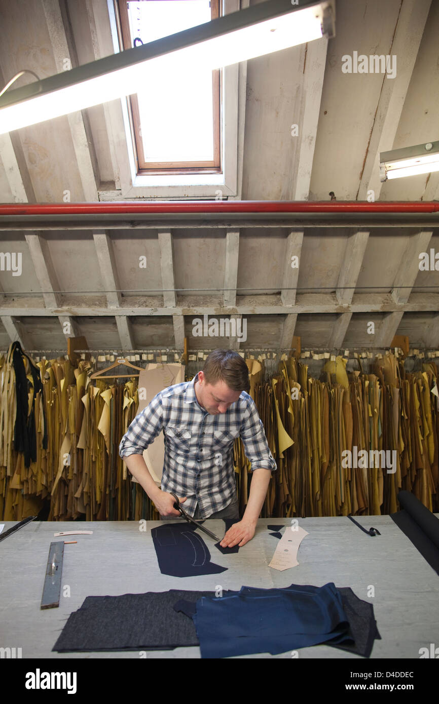 Pattern cutter Rob Turner at British clothes manufacturer Private White ...