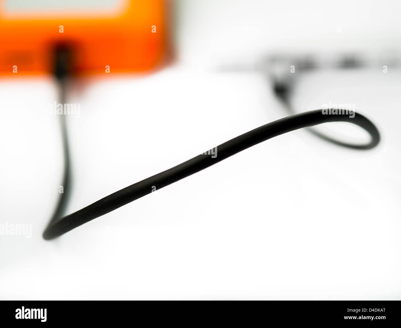 close up aof a connection cable linking data drive to laptop. shallow ...