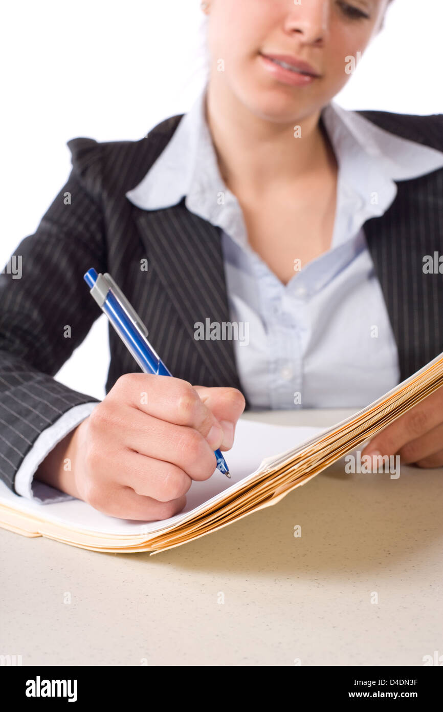 Business Woman Writing notes at desk isolated on white Stock Photo - Alamy