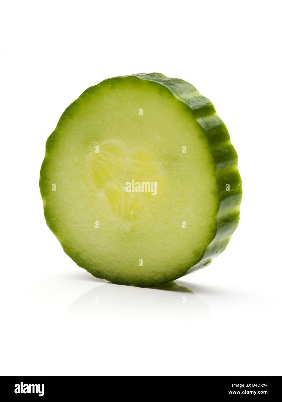 Single cucumber slice isolated on white background Stock Photo - Alamy
