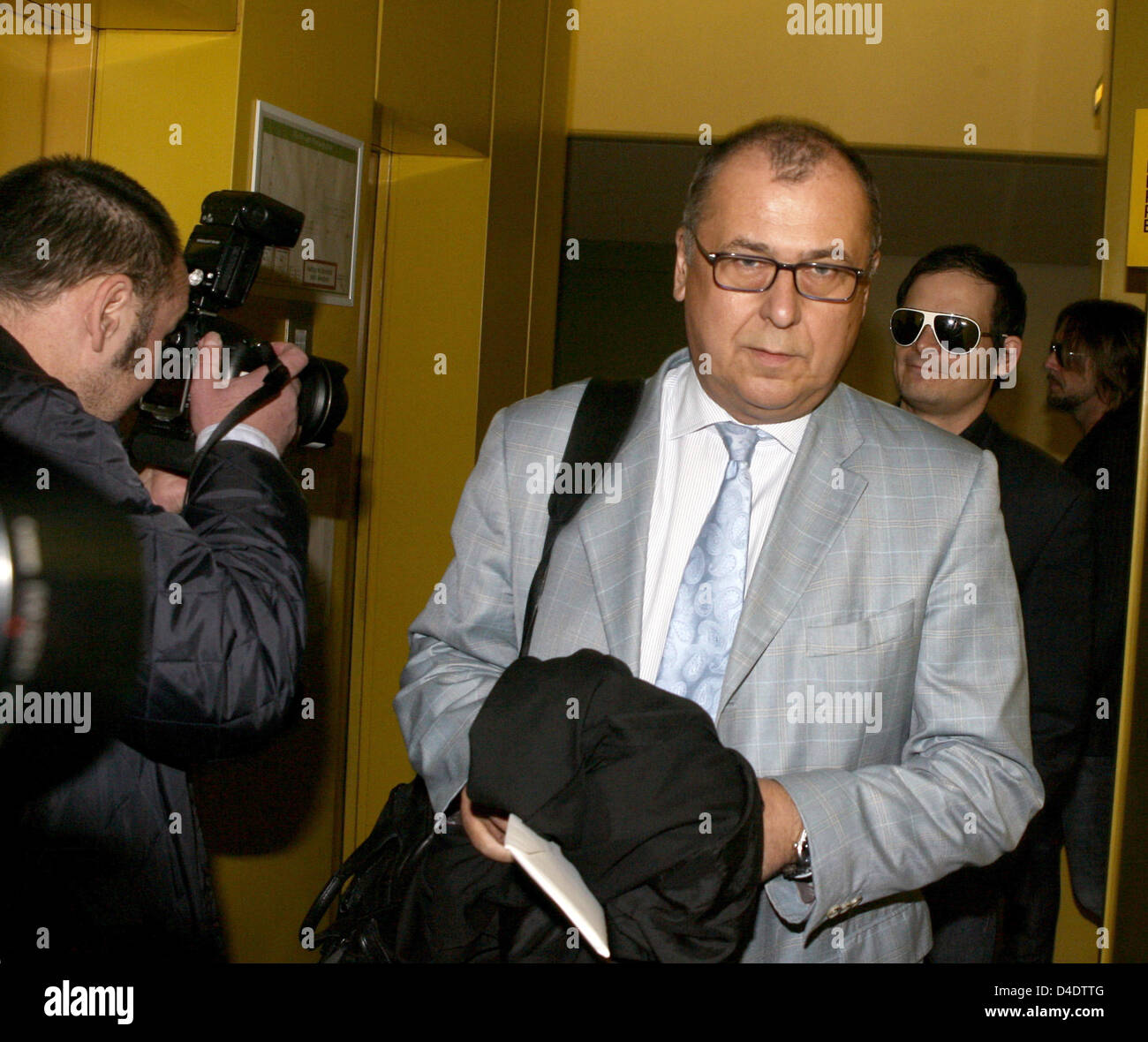 German actor Ben Tewaag (R) and his attorney (front) arrive at the ...