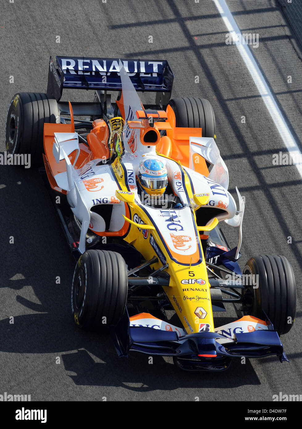 Spanish Formula One driver Fernando Alonso of Renault F1 steers his car ...