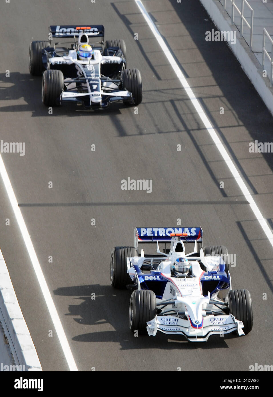 German Formula One drivers Nick Heidfeld of BMW Sauber (bottom) and ...
