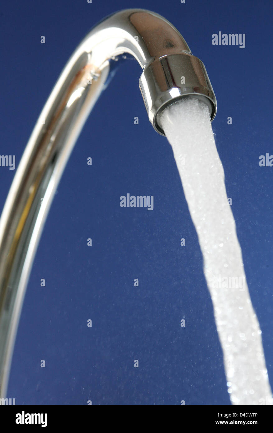 Drinking water pours out of a tap in Neukirchen, Germany, 22 April 2008 ...
