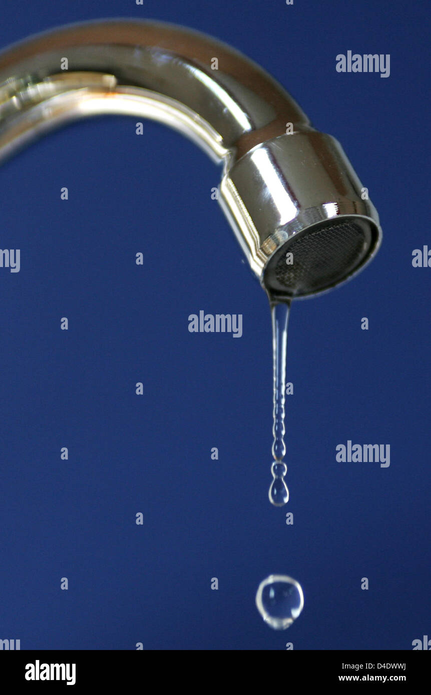 Drinking water drops out of a tap in Neukirchen, Germany, 22 April 2008 ...