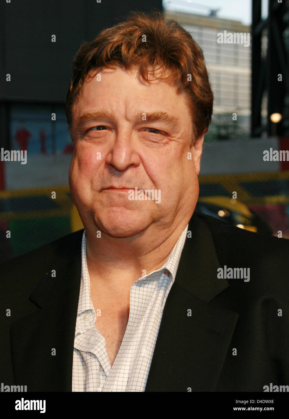 US actor John Goodman poses on the red carpet as he arrives for the European premiere of his ...