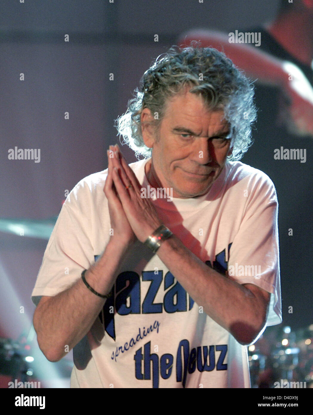 Scottish singer Dan McCafferty (C) and his band Nazareth perform during ...