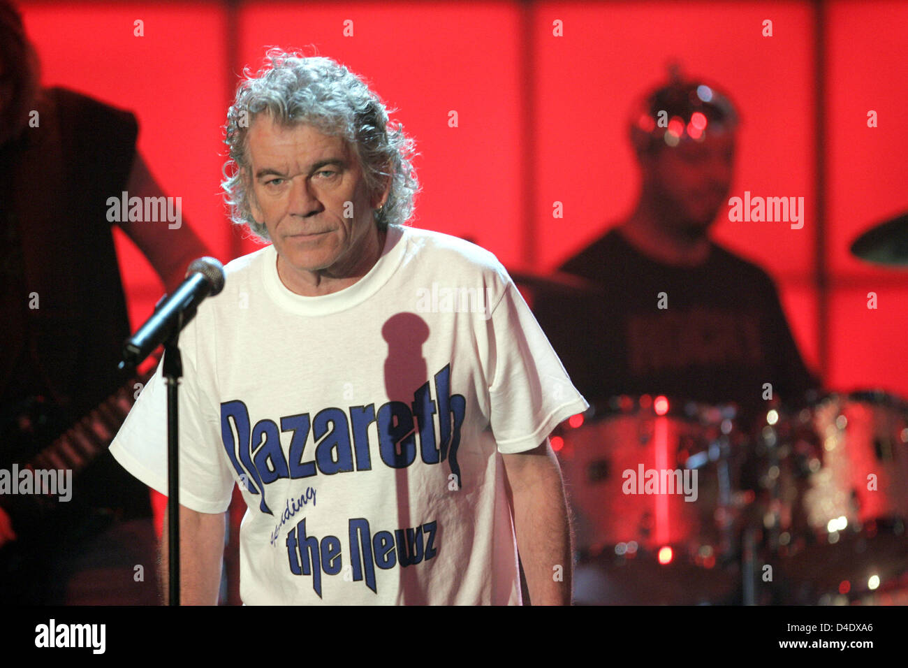 Scottish singer Dan McCafferty (C) and his band Nazareth perform during ...