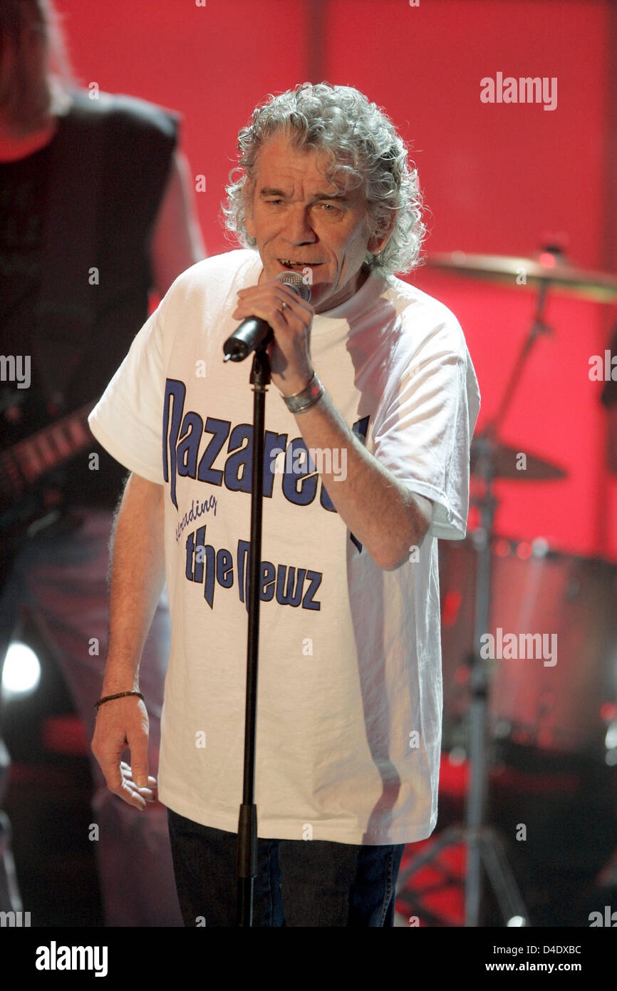 Scottish singer Dan McCafferty (C) and his band Nazareth perform during ...